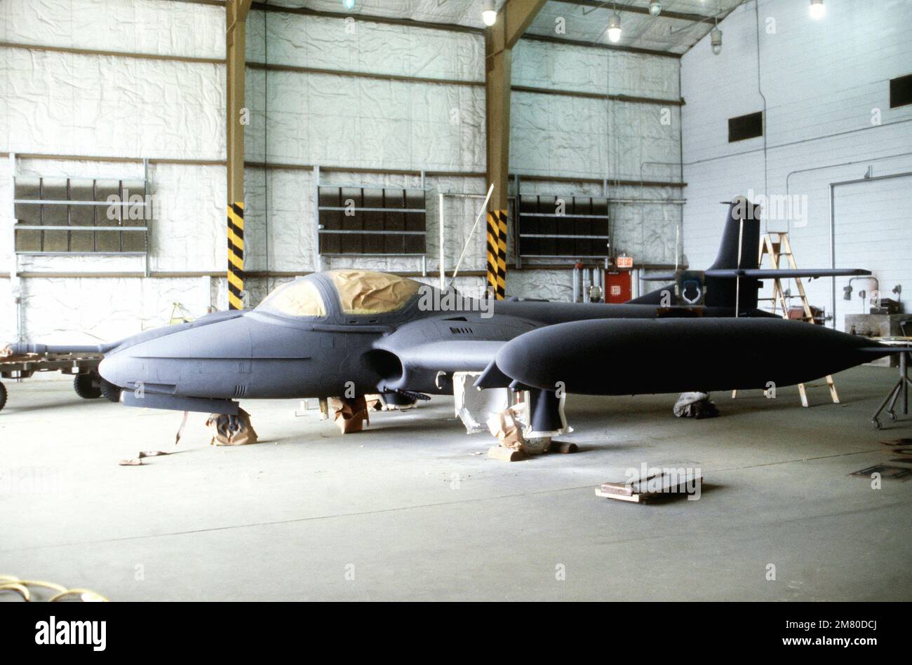 A left front view of an OA-37 Dragonfly aircraft parked in the ...