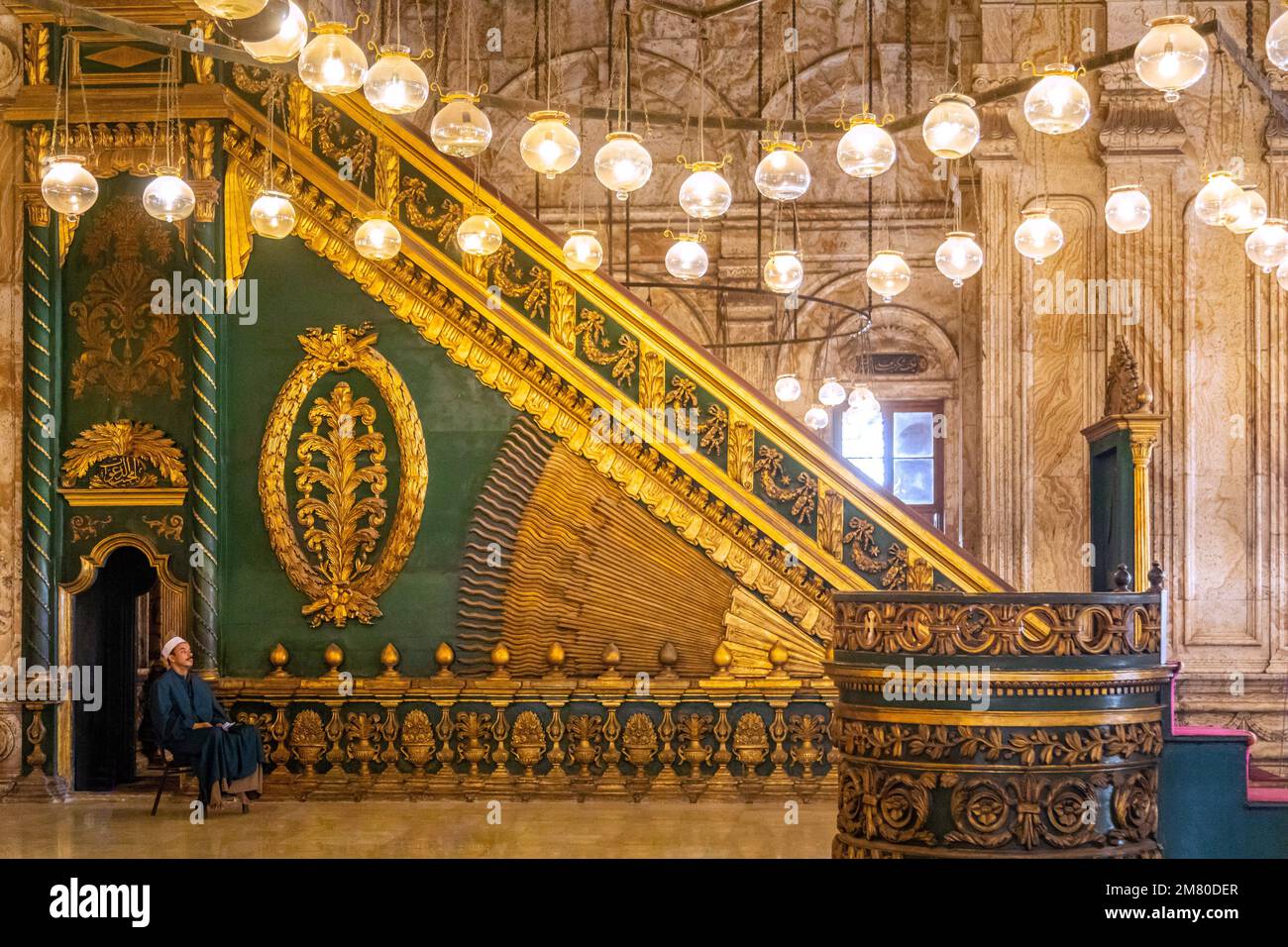 GUARDIAN IN FRONT OF THE MINBAR OF SCULPTED AND GILDED CEDAR INSIDE THE ...