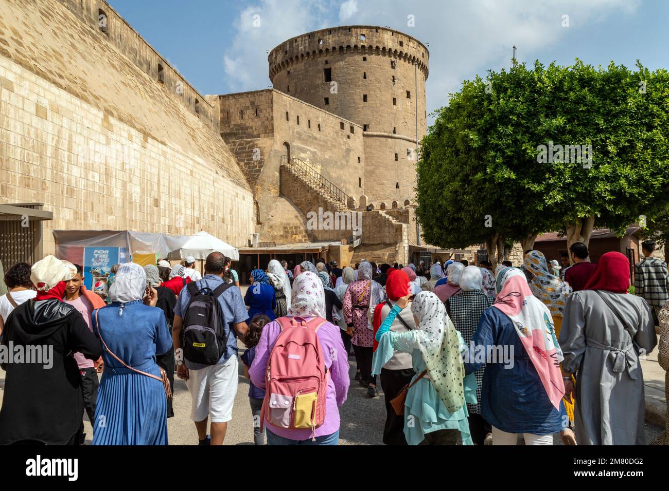 GROUP OF STUDENTS IN FRONT OF THE SALADIN CITADEL, SALAH EL DIN, BUILT ...