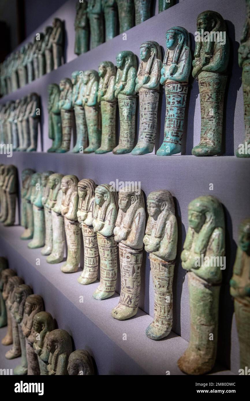 USHABTIS, FUNERARY FIGURINES IN BLUE EARTHENWARE FROM DEIR EL-BAHARI ...
