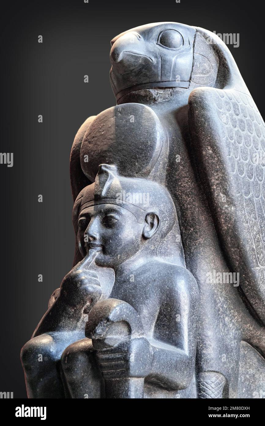 STATUE OF RAMSES II AS A CHILD PROTECTED BY HORUS, THE SUN GOD WITH A ...