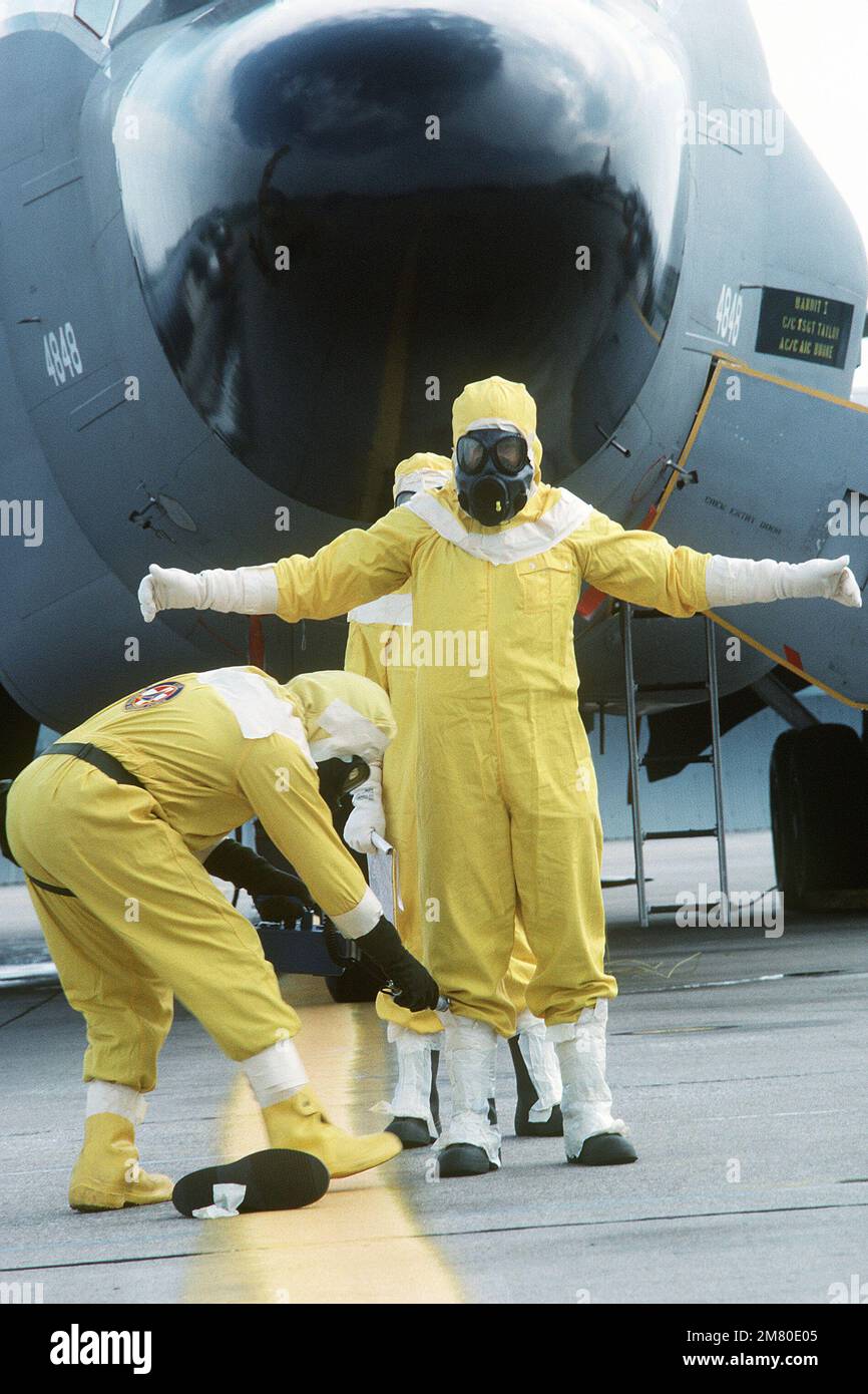 A member of the Disaster Response Force, wearing a nuclear-biological ...