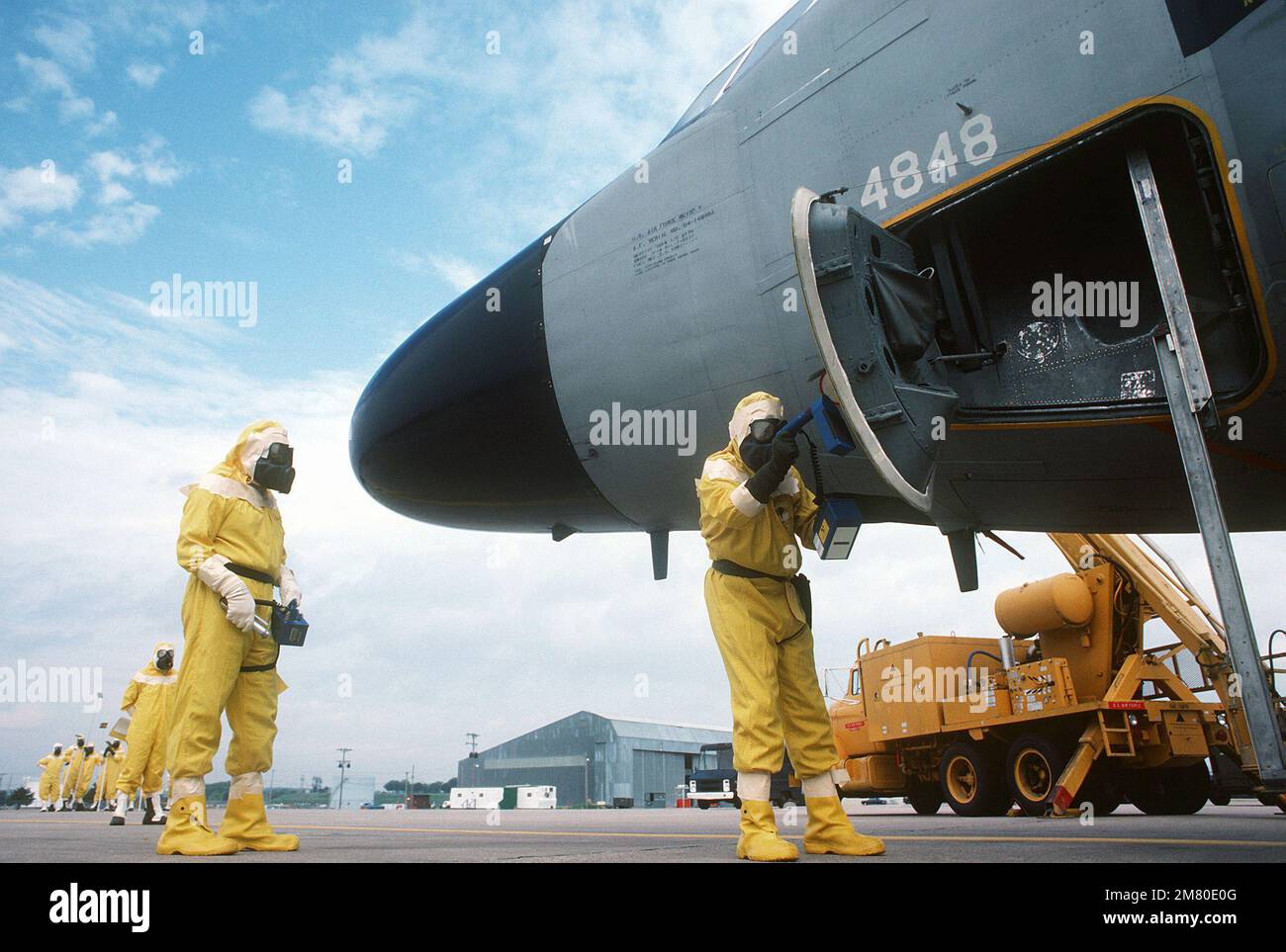 Members of the Disaster Response Force, wearing nuclear-biological ...