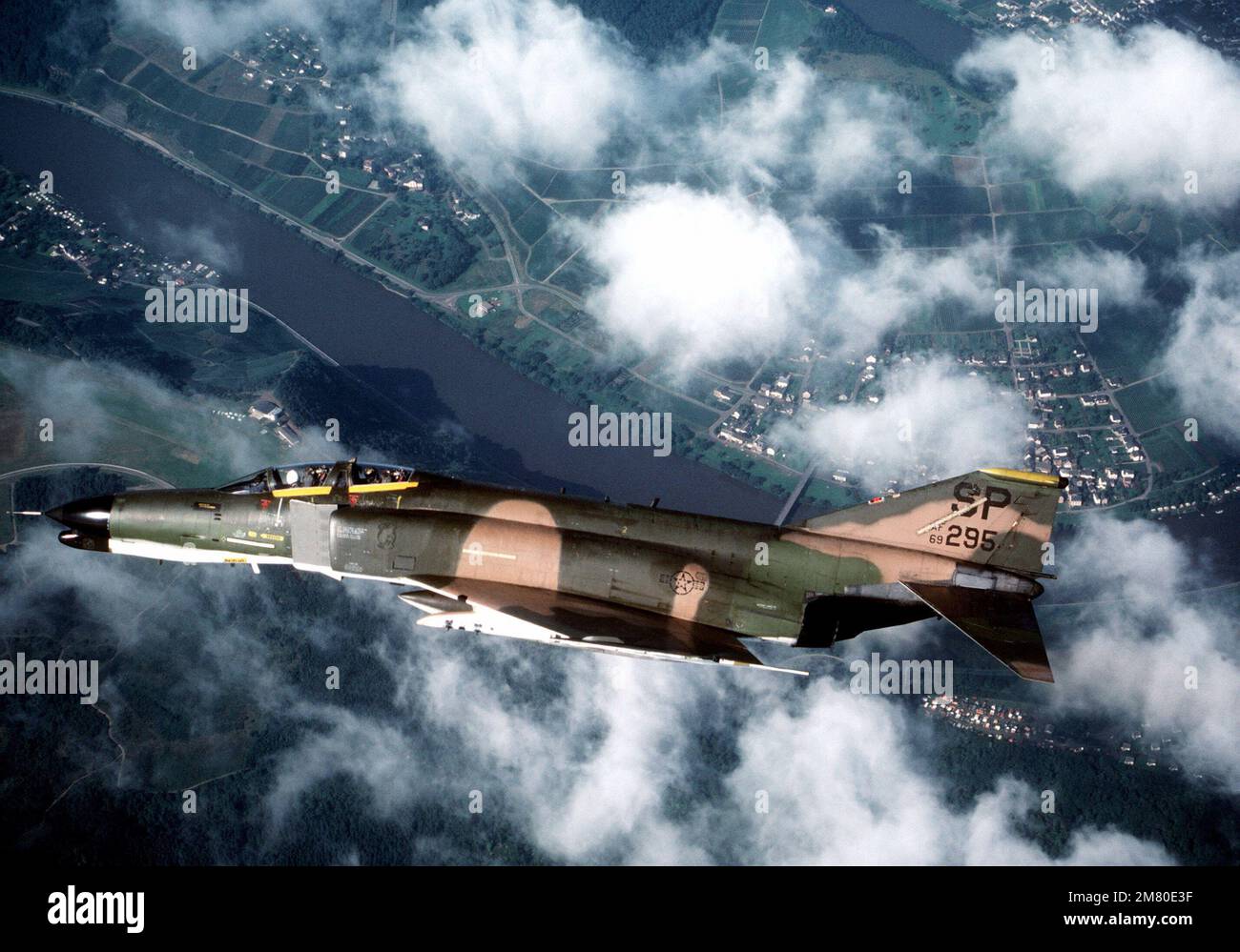 An air-to-air left side view of an F-4G Phantom II Wild Weasel aircraft from the 81st Tactical ...