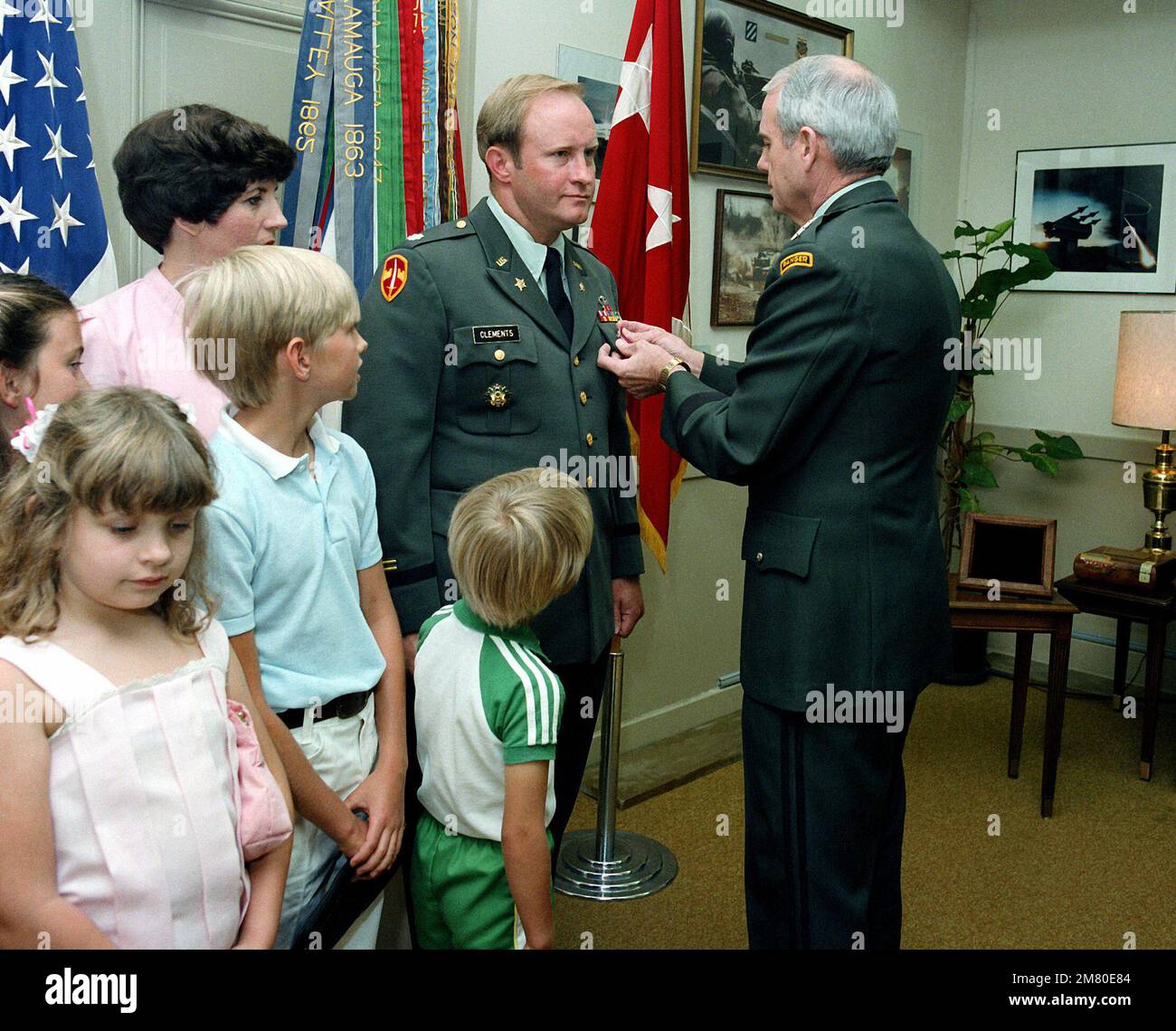 The Legion of Merit is presented to LTC Miles Clements by LGEN Fred ...