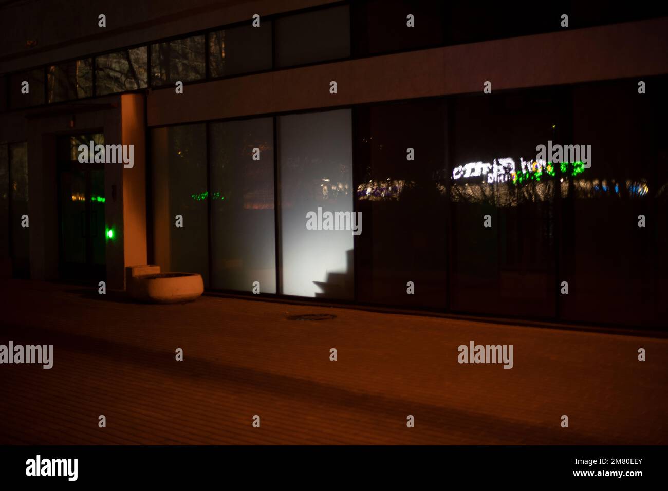 Light in display case at night. Light from building. Showcase details ...