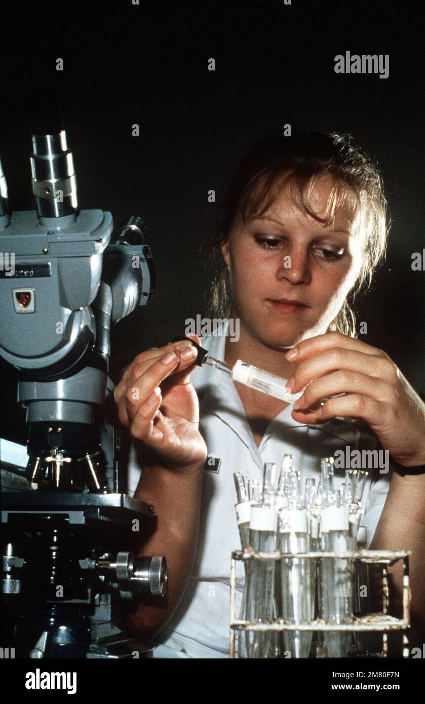 AIRMAN 1ST Class Debra Yeates, a medical laboratory specialist, checks ...