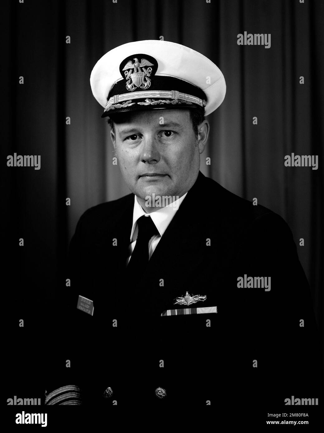 CDR Robert Nielson, USN (covered). Country: Unknown Stock Photo - Alamy