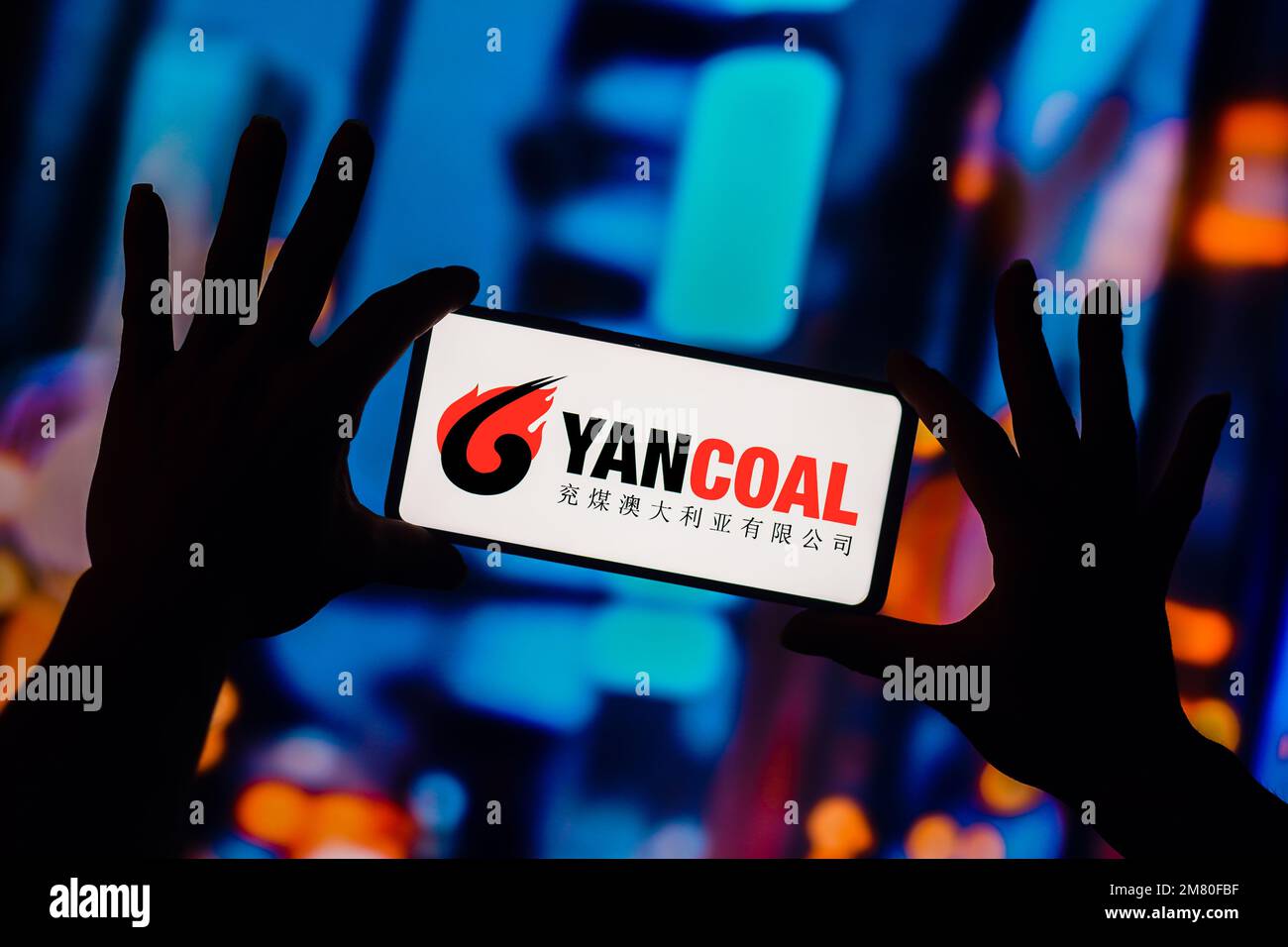 In this photo illustration, the Yancoal logo is displayed on a ...
