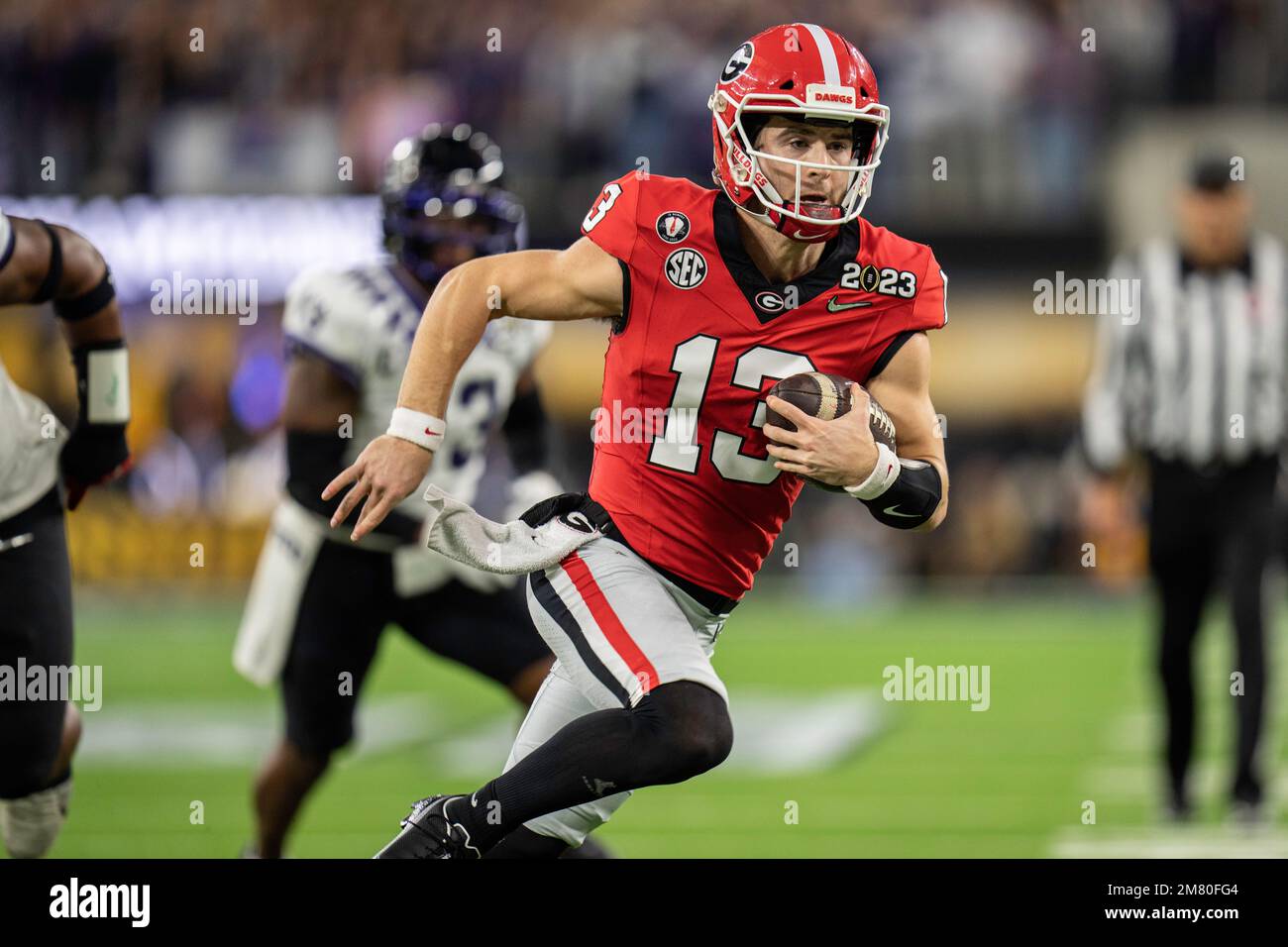 Georgia Bulldogs quarterback Stetson Bennett (13) runs the ball for a ...