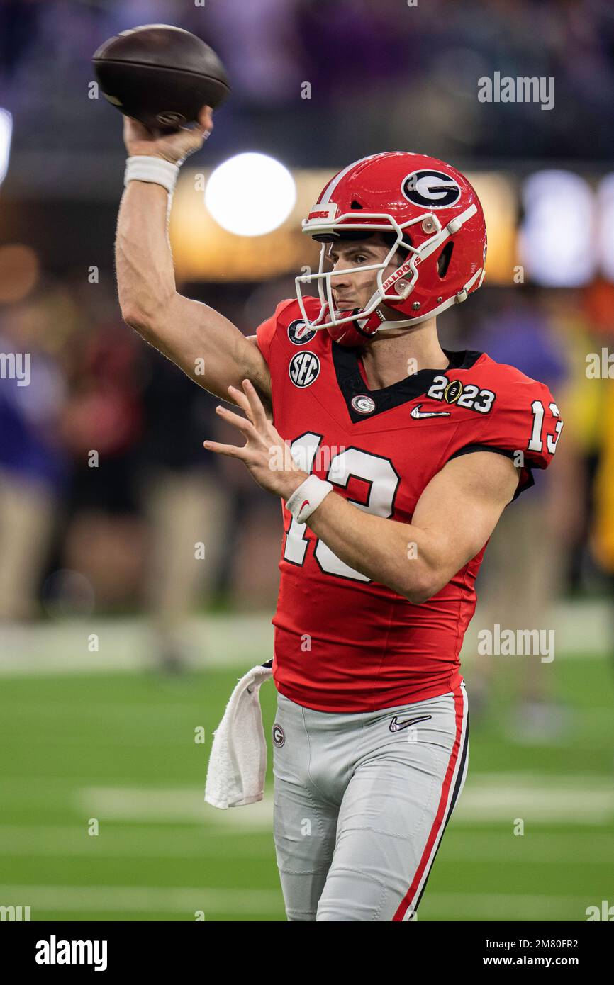 Georgia Bulldogs quarterback Stetson Bennett (13) throws during warm ...