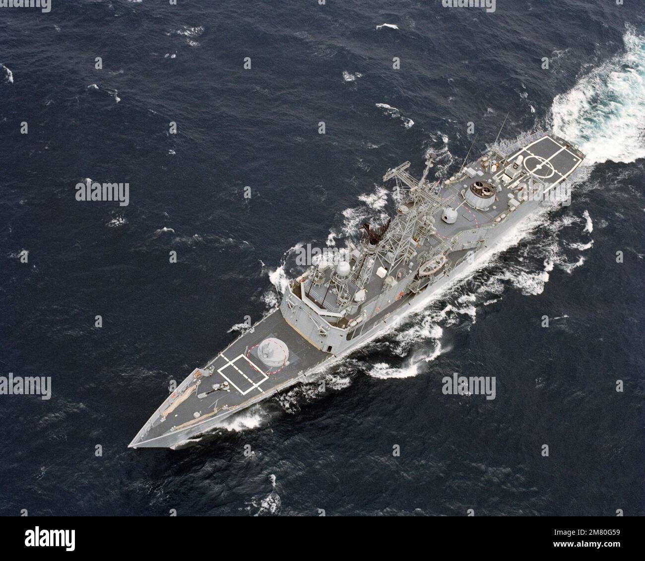Aerial port bow view of the view of the guided missile frigate USS ...