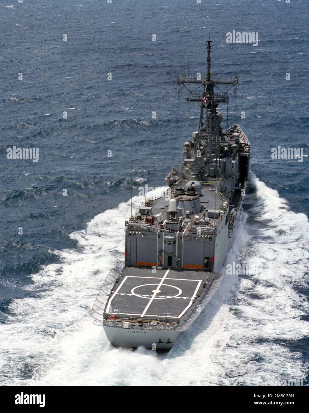 Aerial starboard quarter view of the guided missile frigate USS CURTS ...