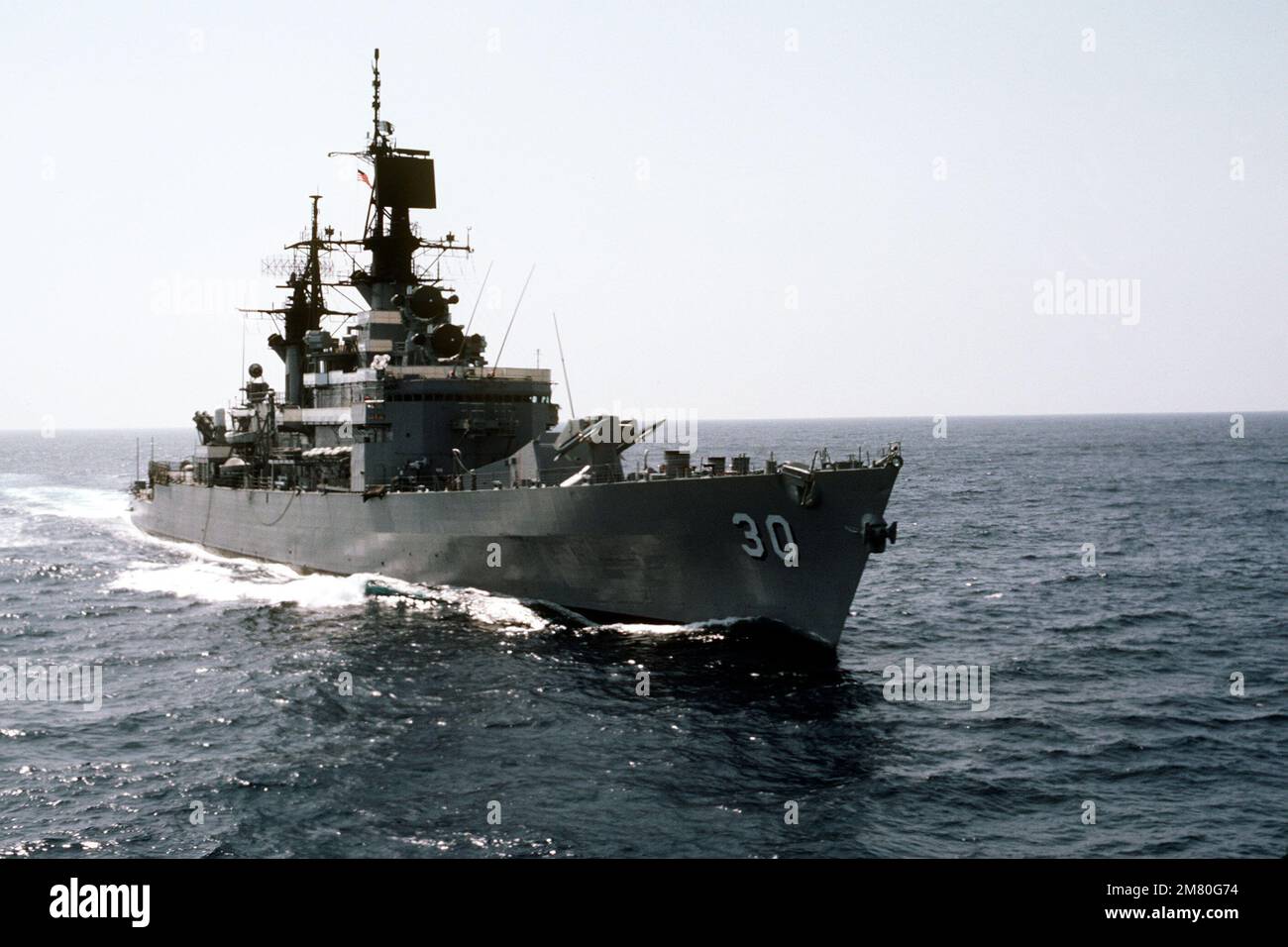A low-angle starboard bow view of the guided missile cruiser USS HORNE ...