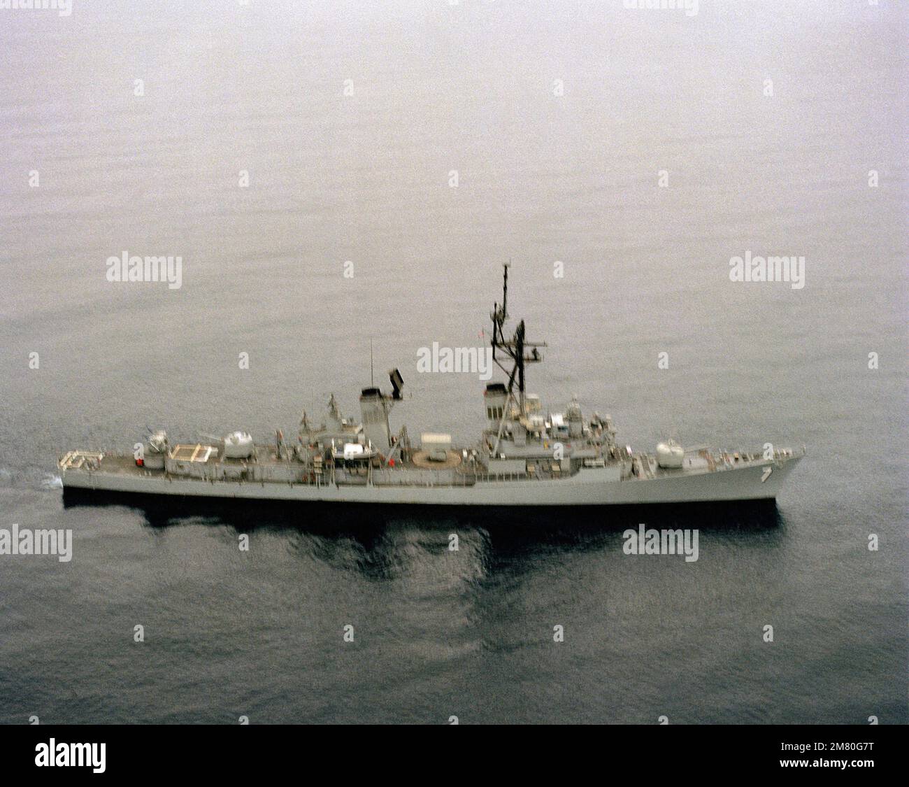 A starboard beam view of the guided missile destroyer USS HENRY B ...
