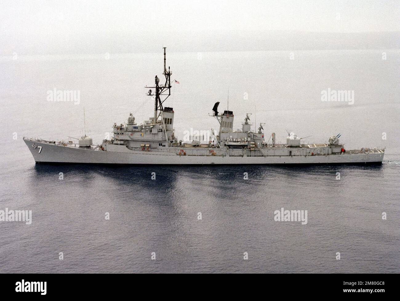 An aerial port beam view of the guided missile destroyer USS HENRY B ...