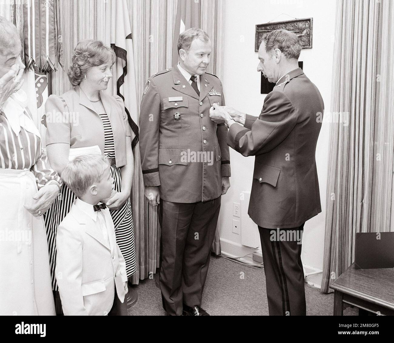 Upon his retirement, LTC Douglas K. Mosier receives the Legion of Merit ...