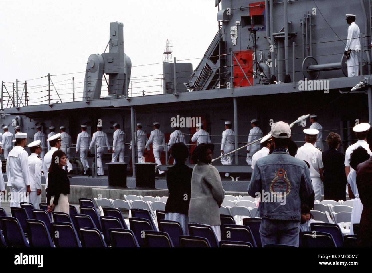 Crew members disembark from their ship for the last time at the ...