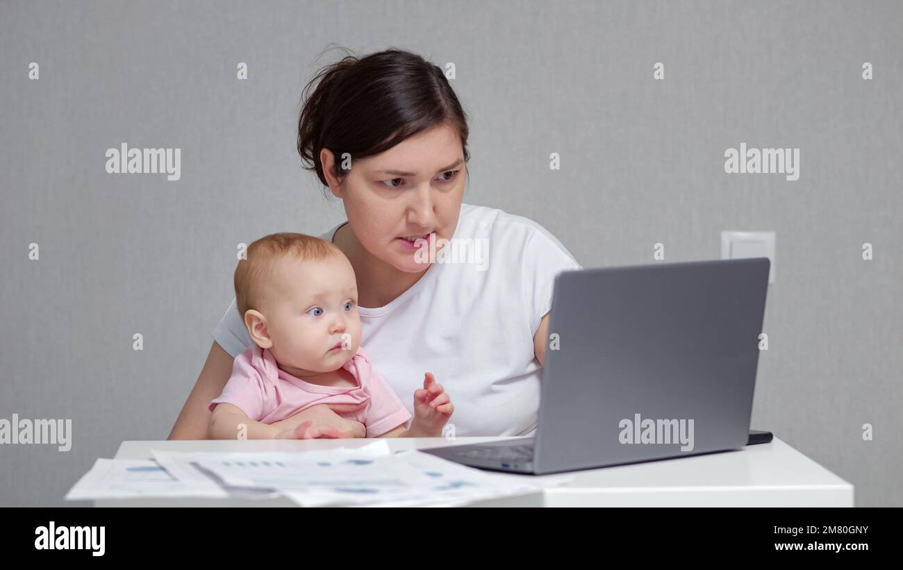 Baby working on laptop hi-res stock photography and images - Alamy