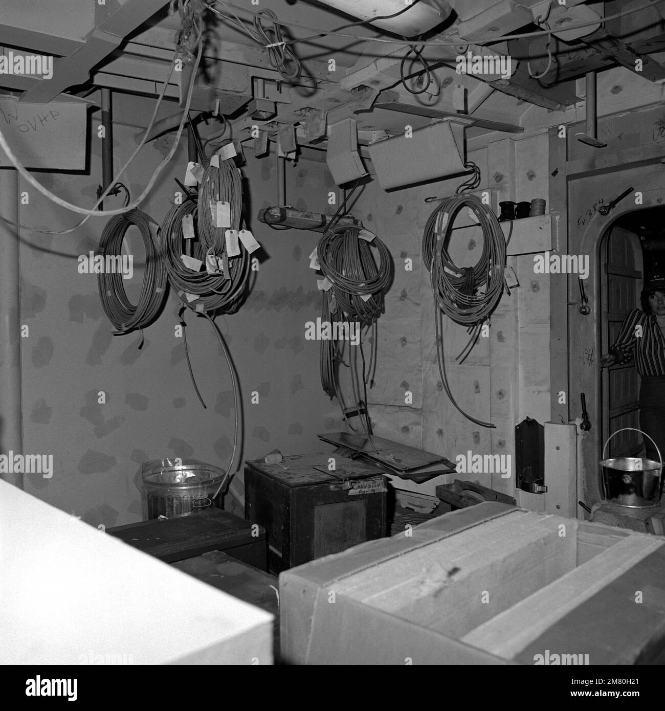 The helicopter hauldown and traverse machinery room aboard the guided ...