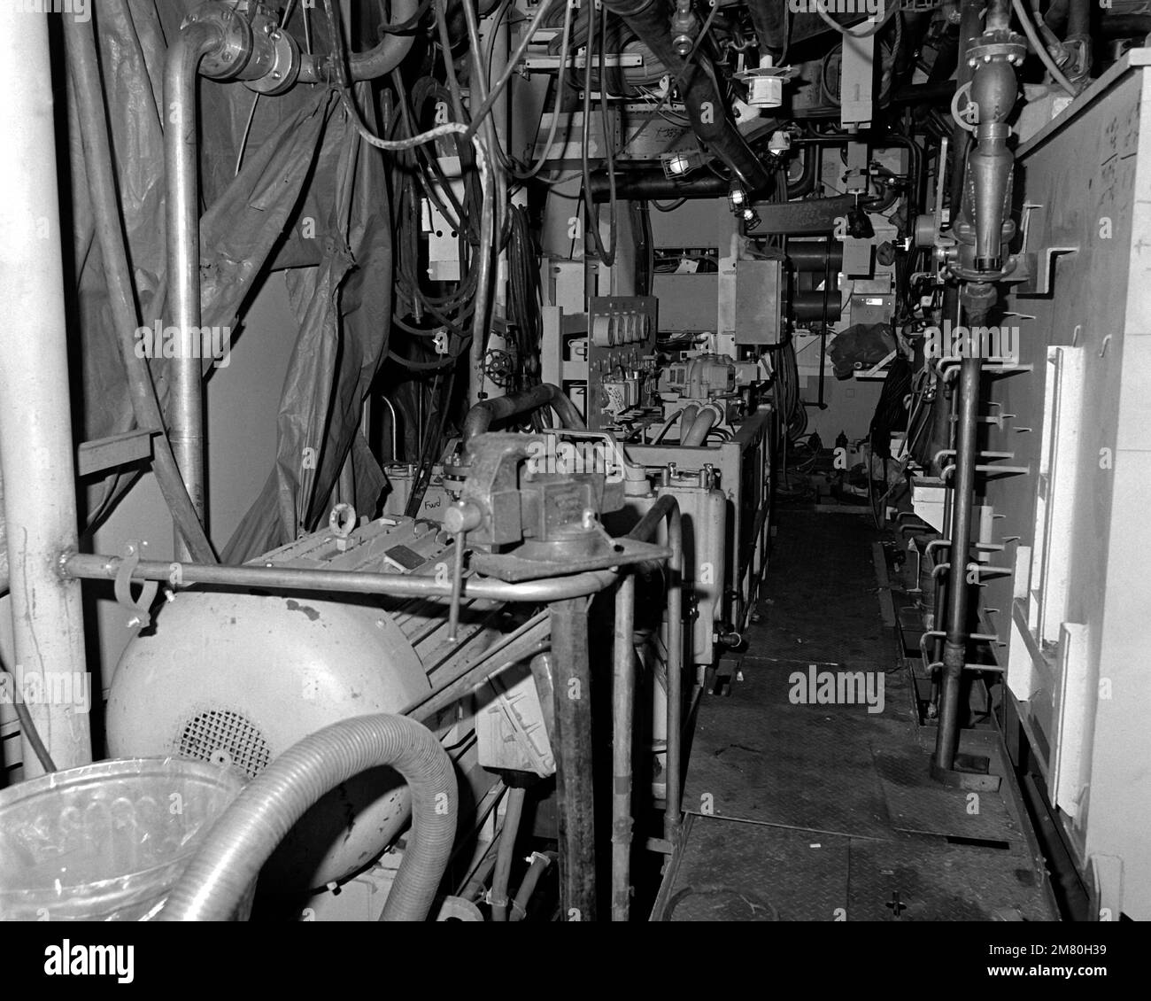 The lower level engine room aboard the guided missile frigate ROBERT G ...