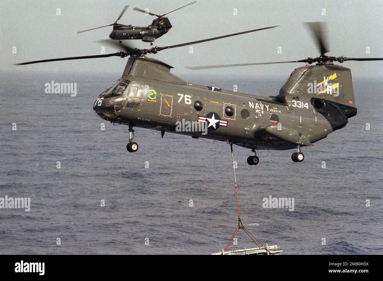 Two CH-46 Sea Knight helicopters from Helicopter Combat Support ...