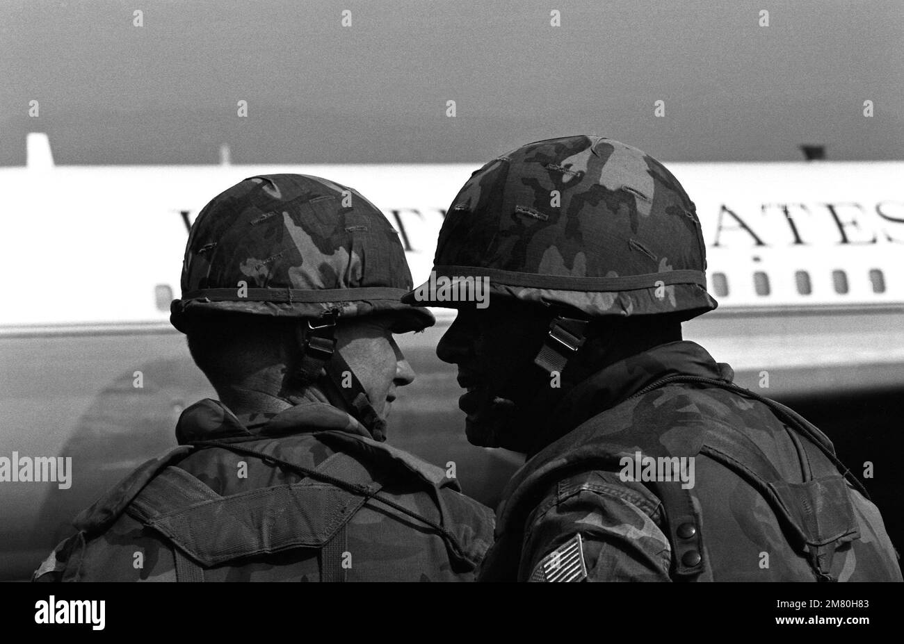 A view of two Marines participating as members of a multinational ...