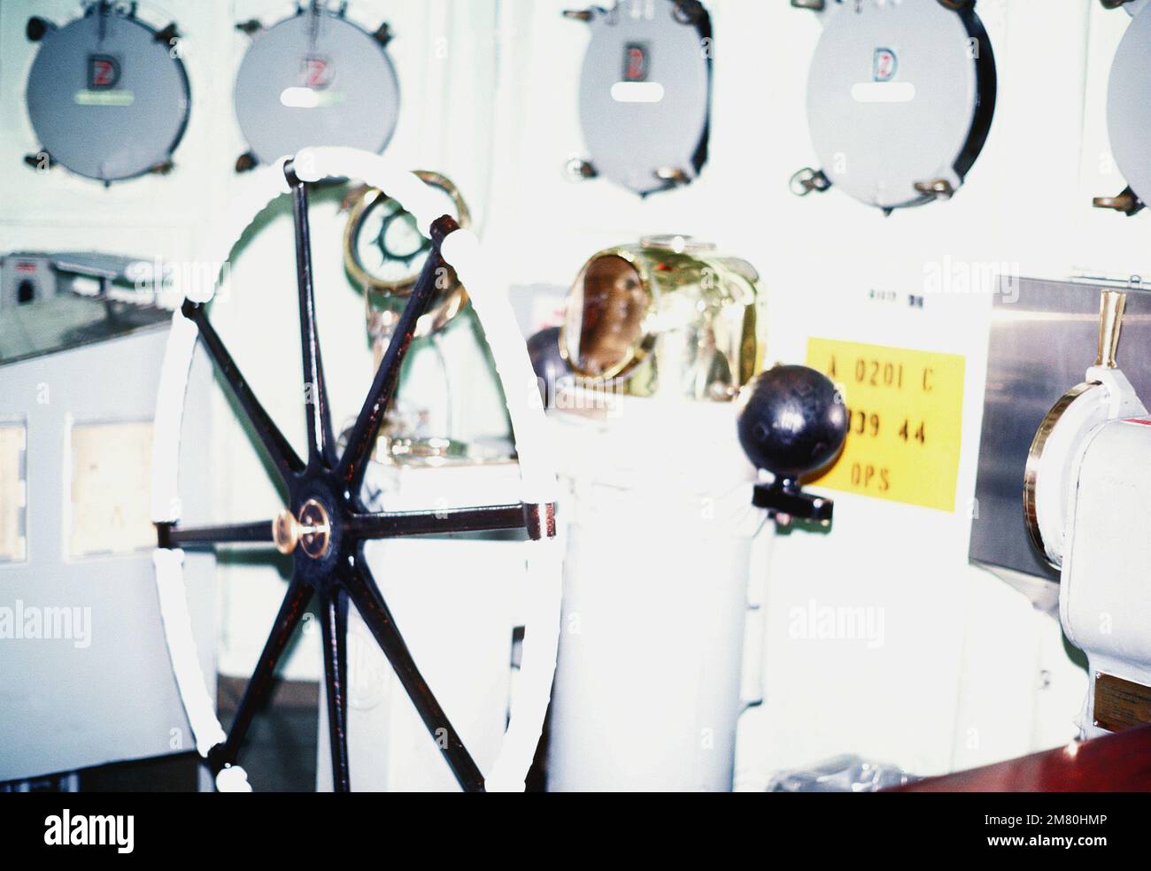 An interior view of the enclosed wheelhouse of the salvage ship USS ...