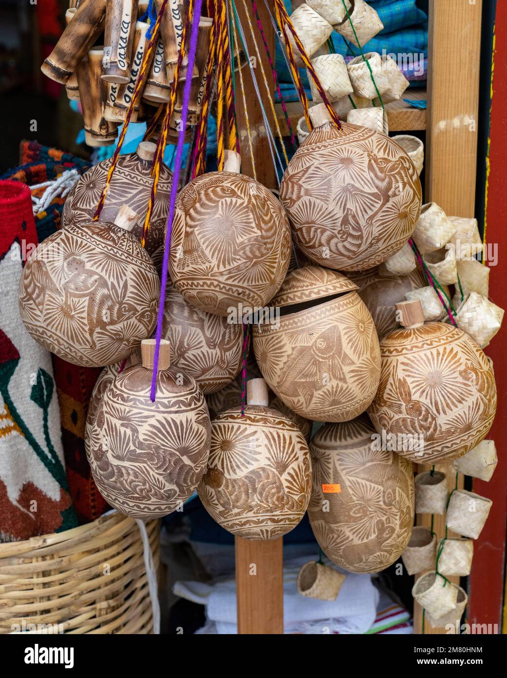 Carved gourds with animal patterns for holding mescal for sale on the ...