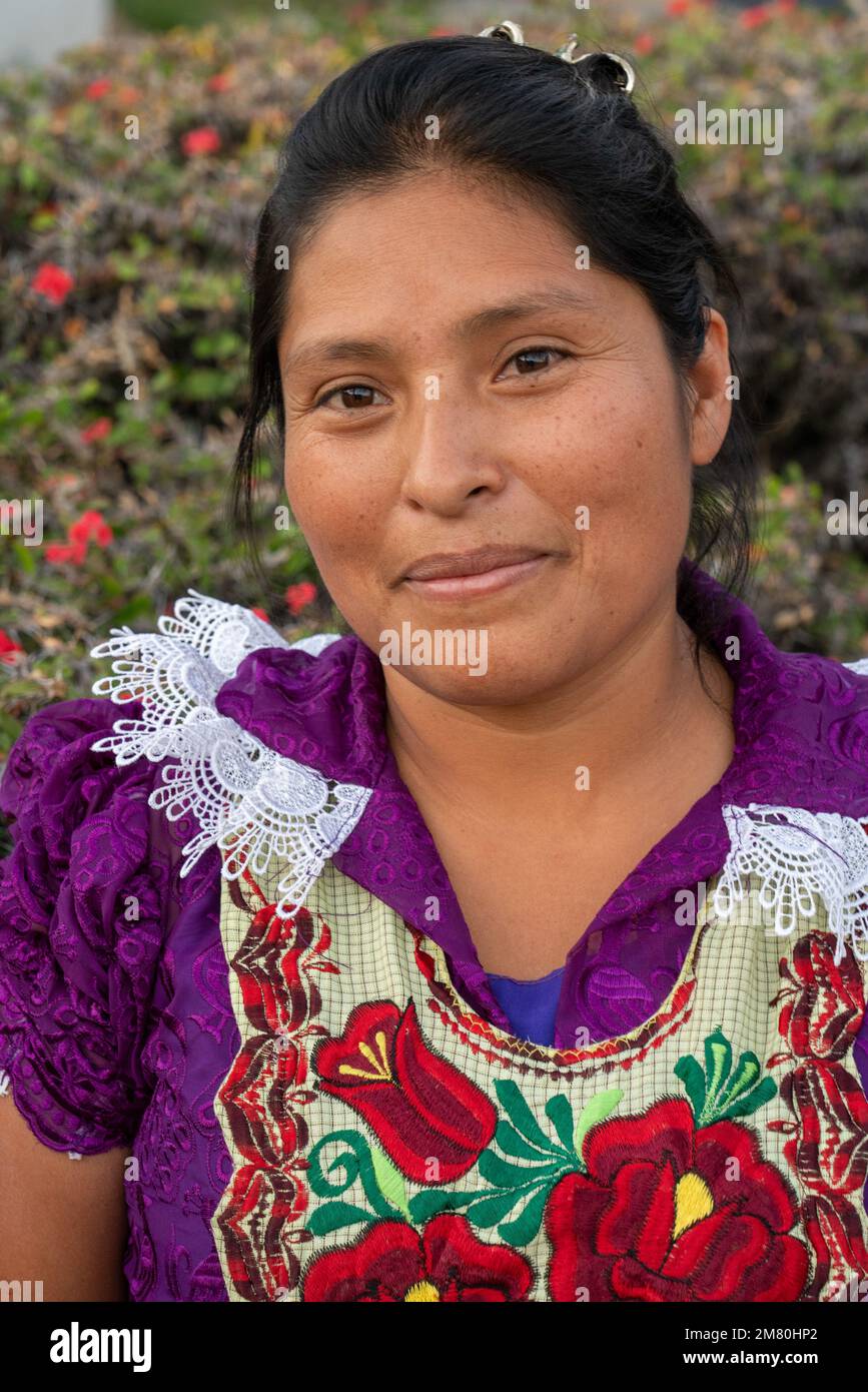 A young indigenous Zapotec woman in her traditional dress from San Miguel del Valle near Oaxaca ...