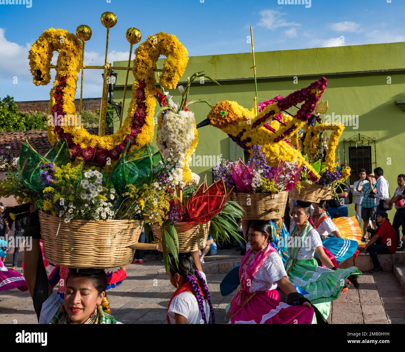 Chinas Oaxaquenas dancers with decorated flower baskets on their heads ...