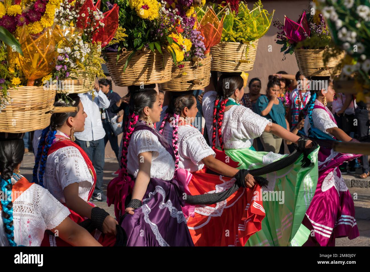 Chinas Oaxaquenas dancers with decorated flower baskets on their heads ...