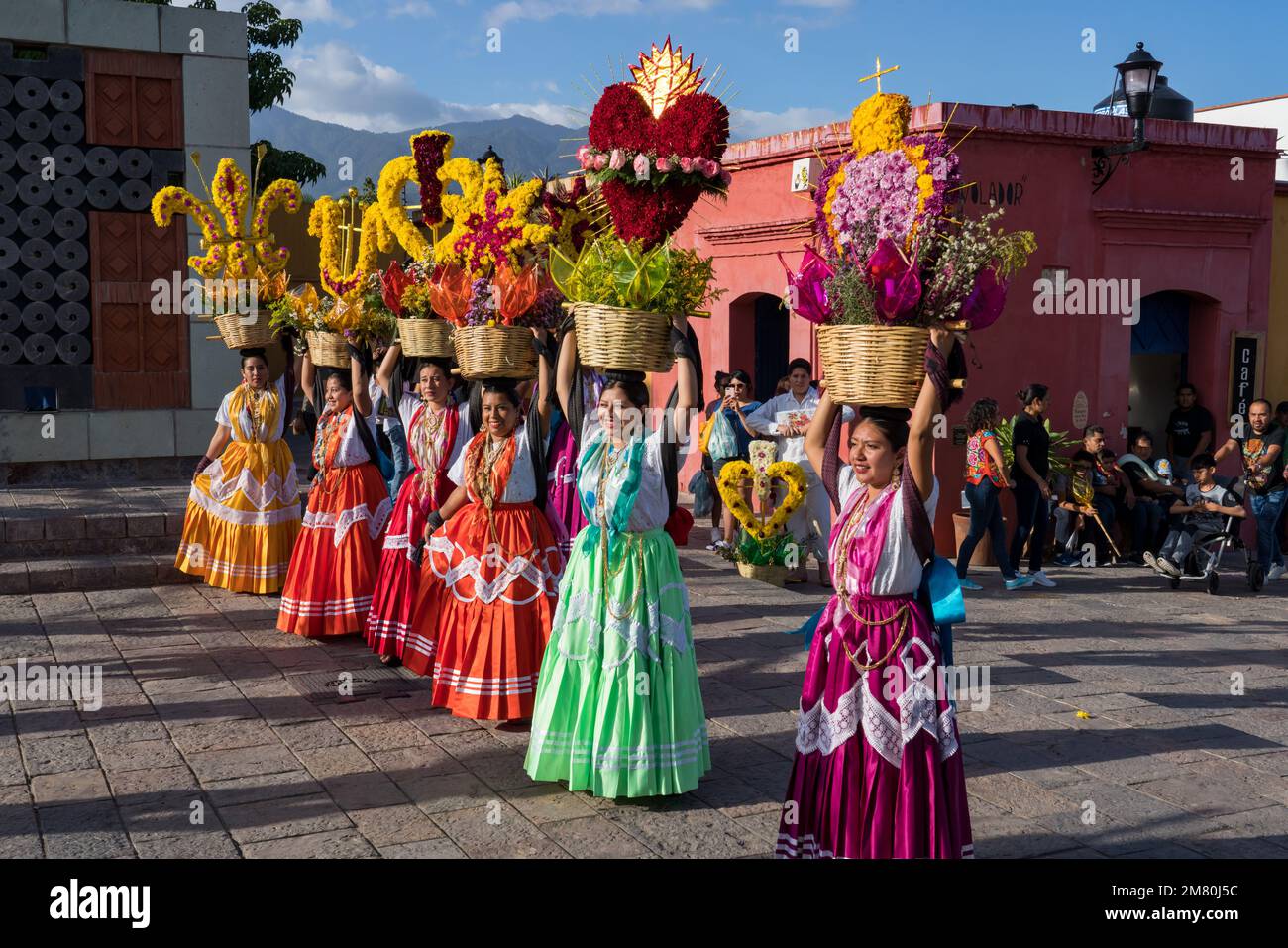 Chinas Oaxaquenas dancers with decorated flower baskets on their heads ...