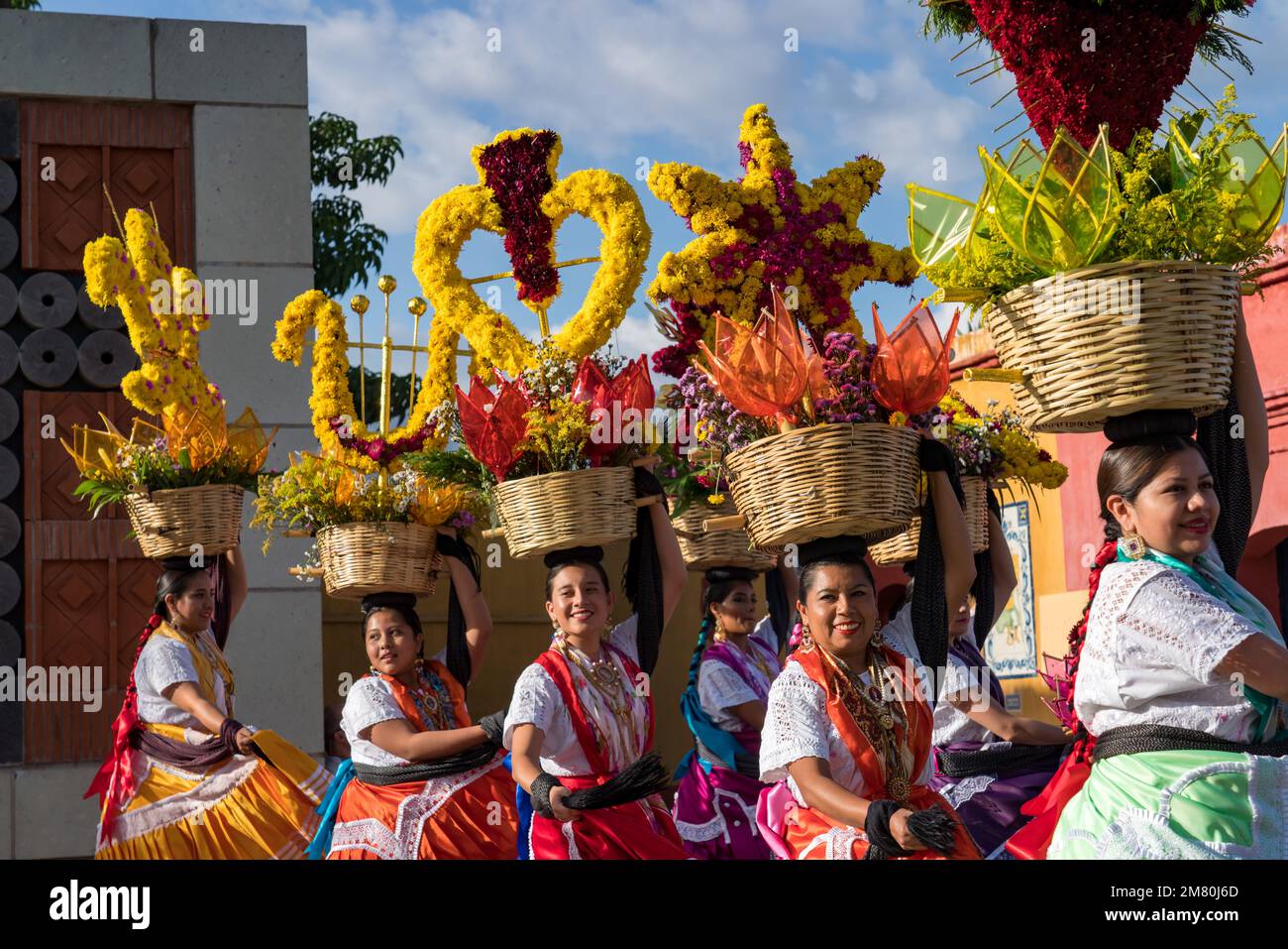 Chinas Oaxaquenas dancers with decorated flower baskets on their heads ...