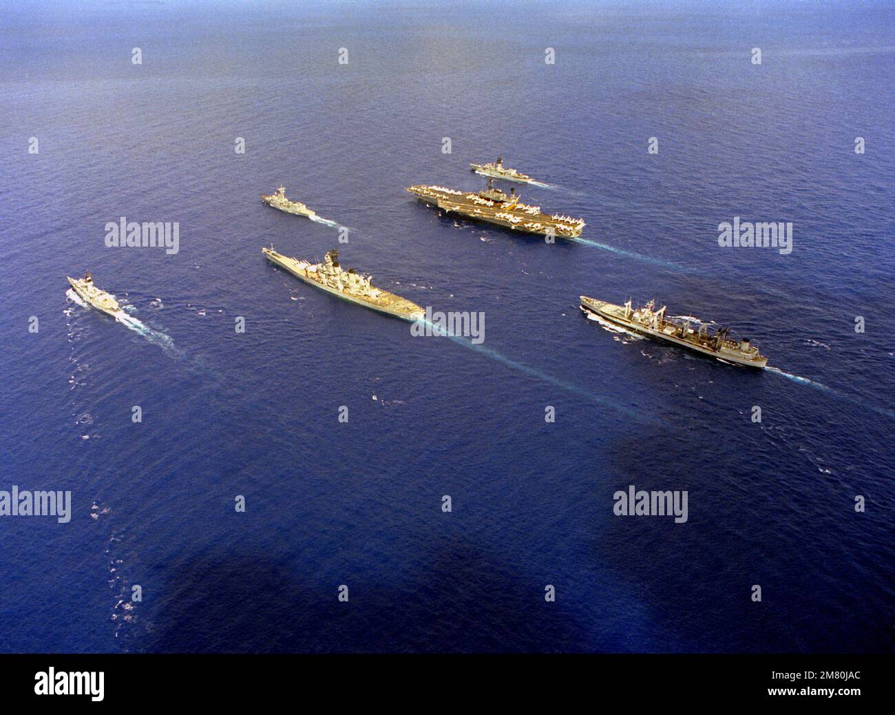 A port quarter view of the aircraft carrier USS MIDWAY (CV-41) battle ...