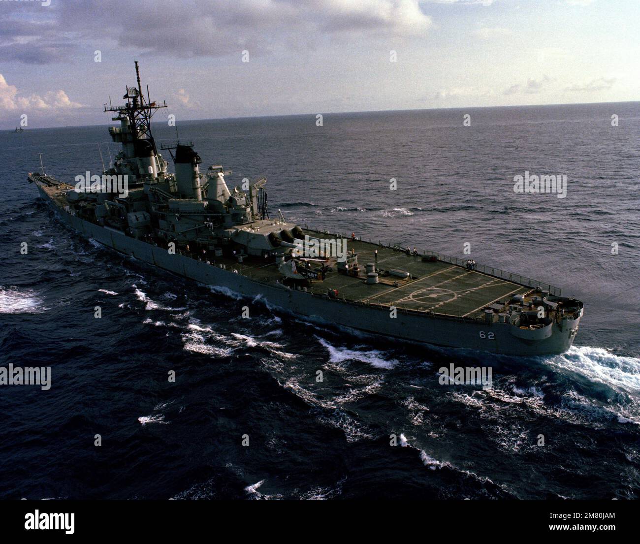 A port quarter view of the battleship USS NEW JERSEY (BB-62) underway ...