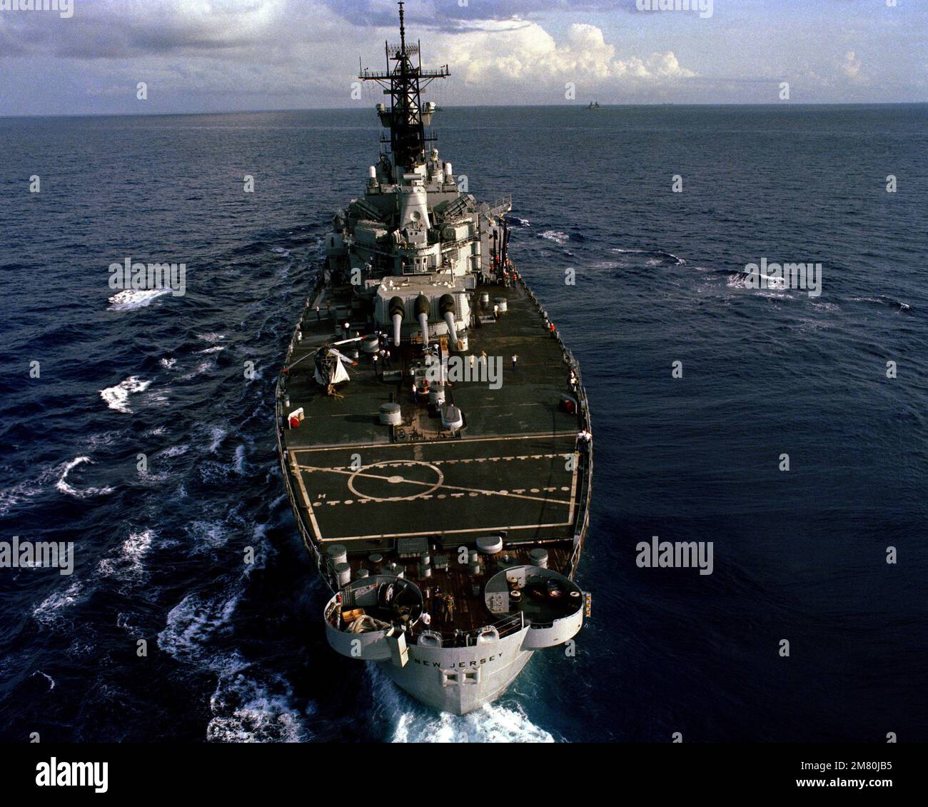 A stern view of the battleship USS NEW JERSEY (BB-62) underway. Country ...