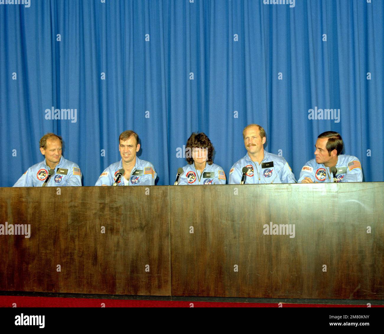Space shuttle Challenger astronauts attend a press conference upon ...