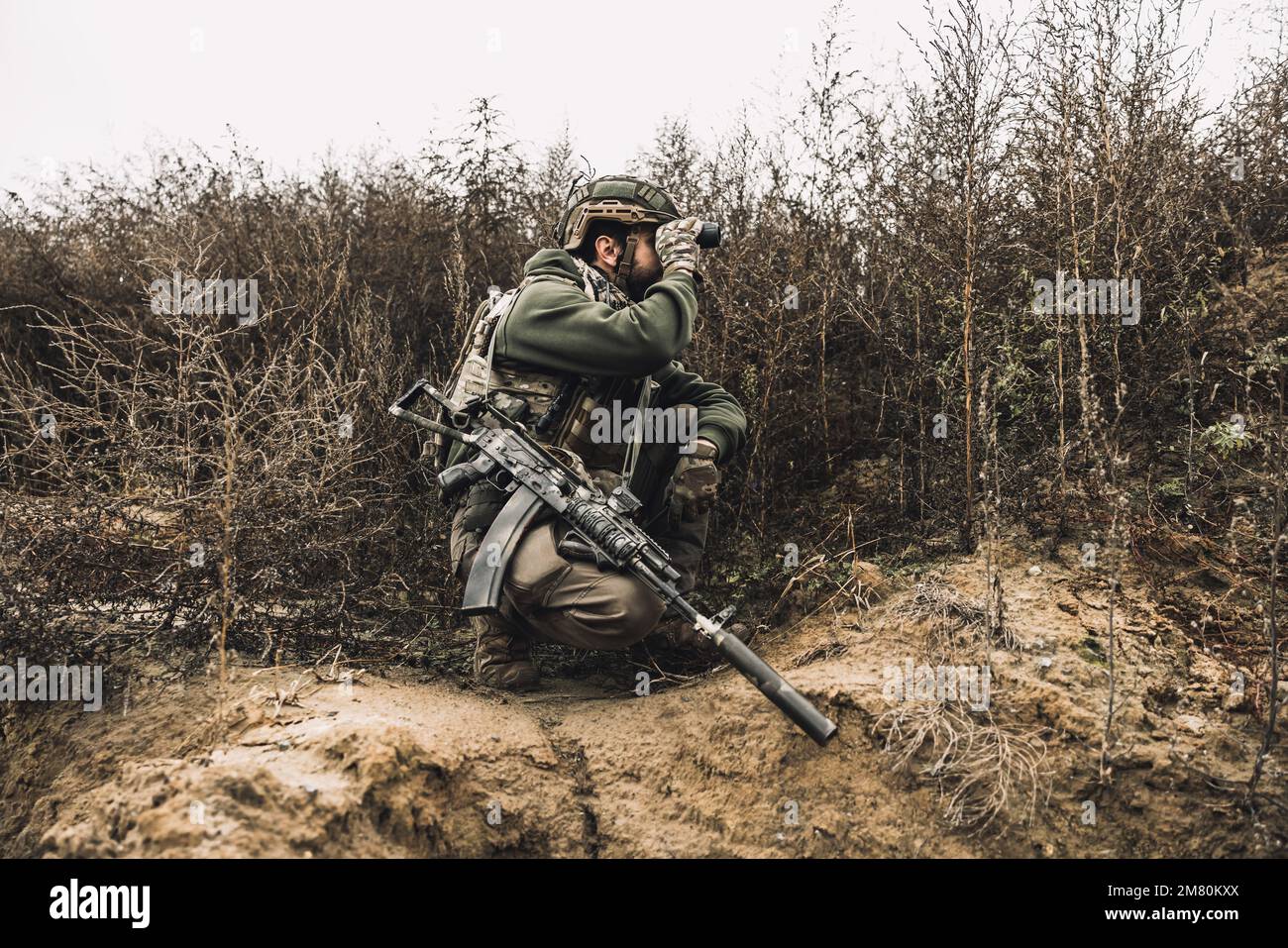 Military reconnoiter investigating the place Stock Photo - Alamy
