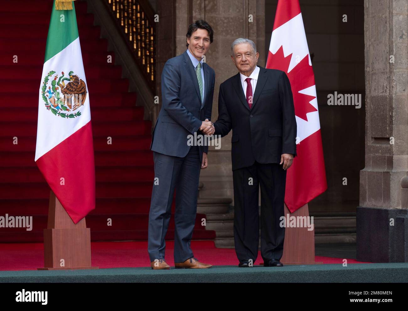 Prime Minister Justin Trudeau shakes hands with Mexican President ...
