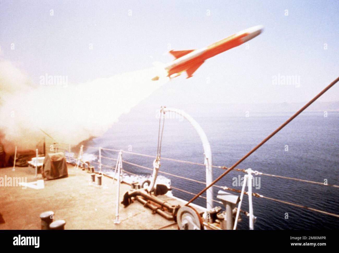 An Otomat anti-ship missile is fired from a ship-mounted launcher. This ...