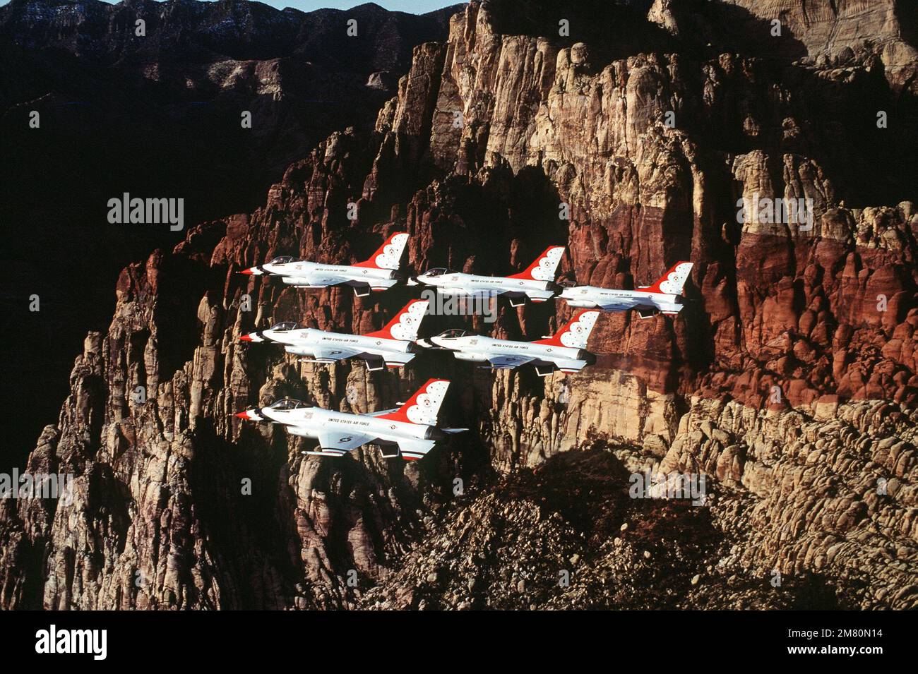 An air-to-air left side view of five USAF Thunderbird F-16 Fighting ...