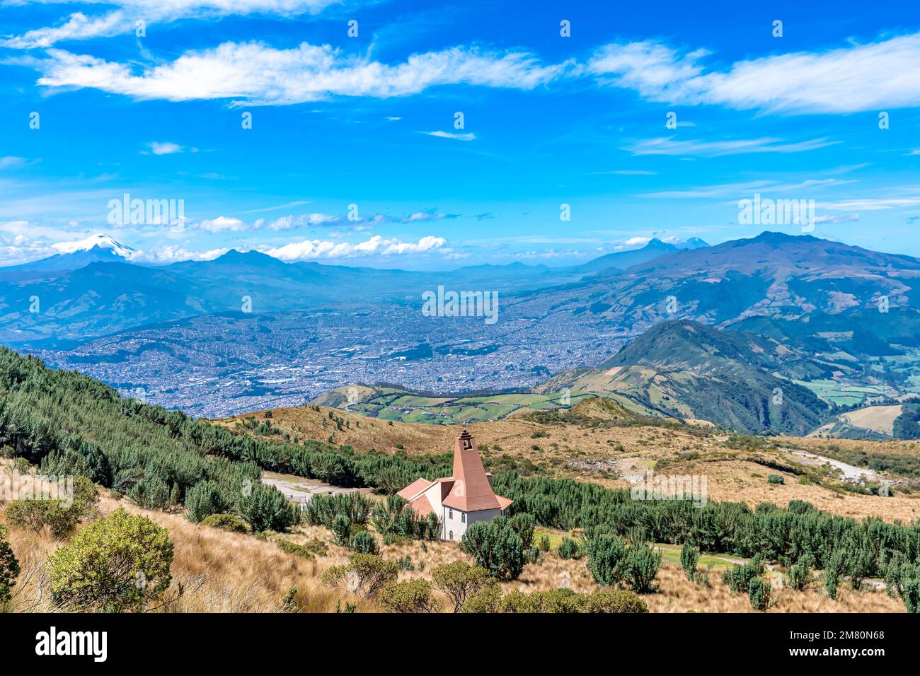 View of volcanoes and mountains above the city of Quito in Ecuador ...