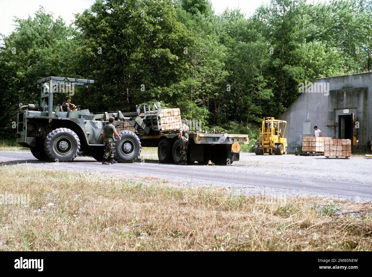 Army reservists of the 351st Ordnance Co. from Romney, W.V., offload a ...