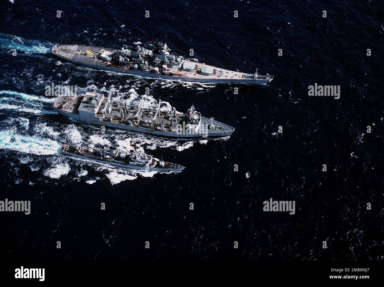 A starboard beam view of the replenishment oiler USS KANSAS CITY (AOR-3 ...