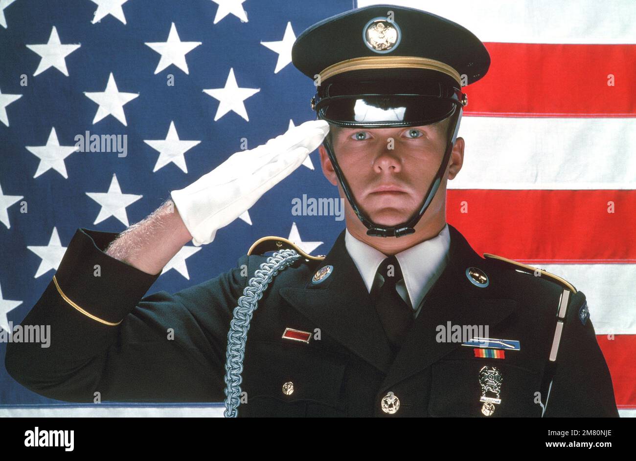 SPECIALIST Fourth Class (SPC) Jack Wheeler salutes during a performance ...