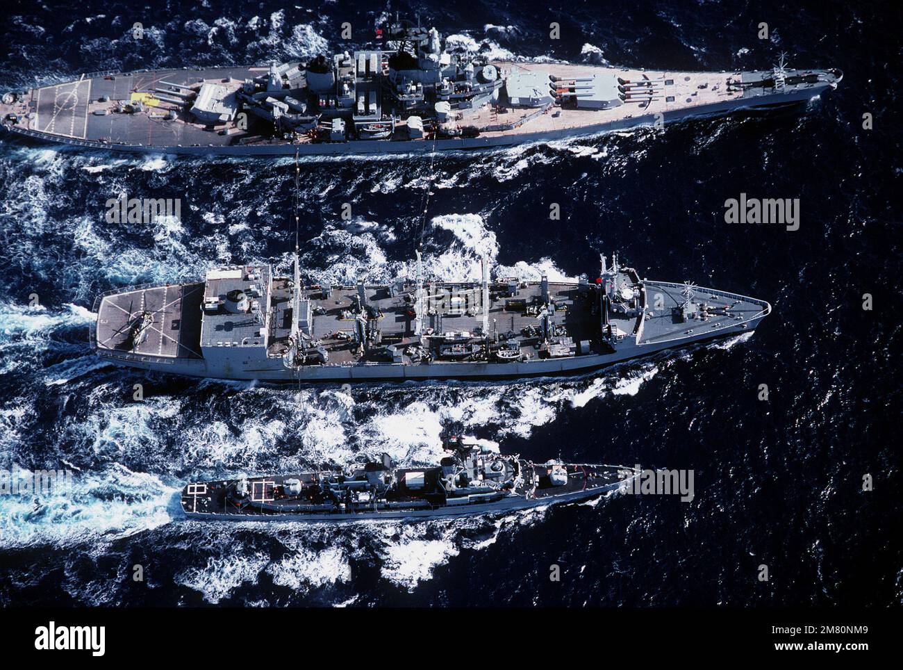 An aerial starboard beam view of the replenishment oiler USS KANSAS ...