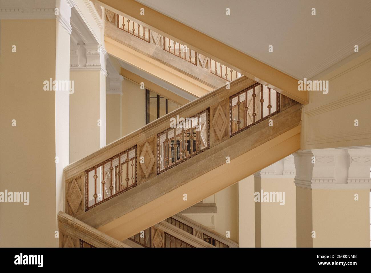 A classic wooden zig-zag staircase - indoor architecture Stock Photo ...