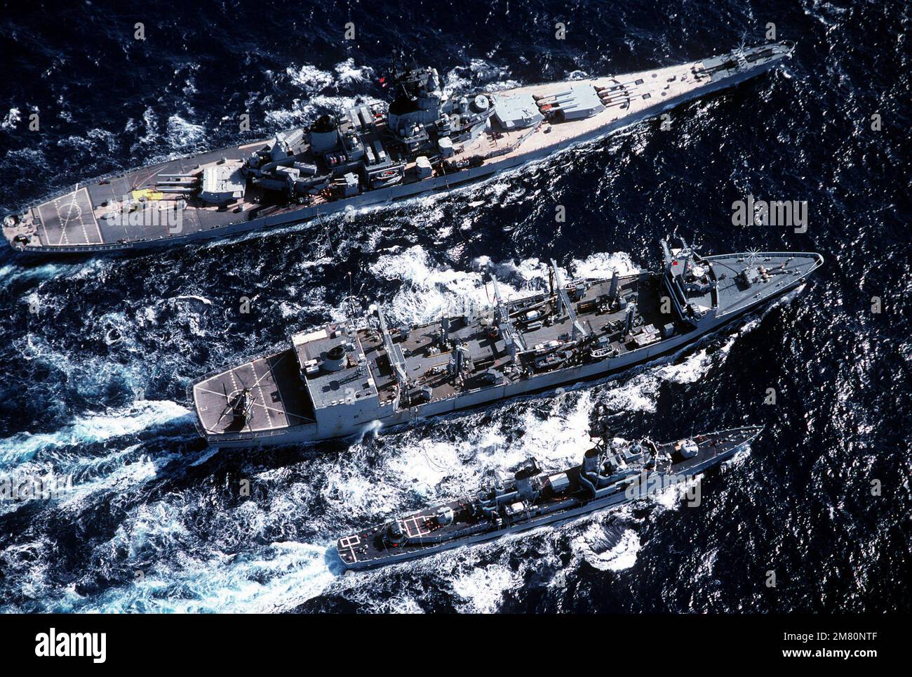An aerial starboard view of the replenishment oiler USS KANSAS CITY ...