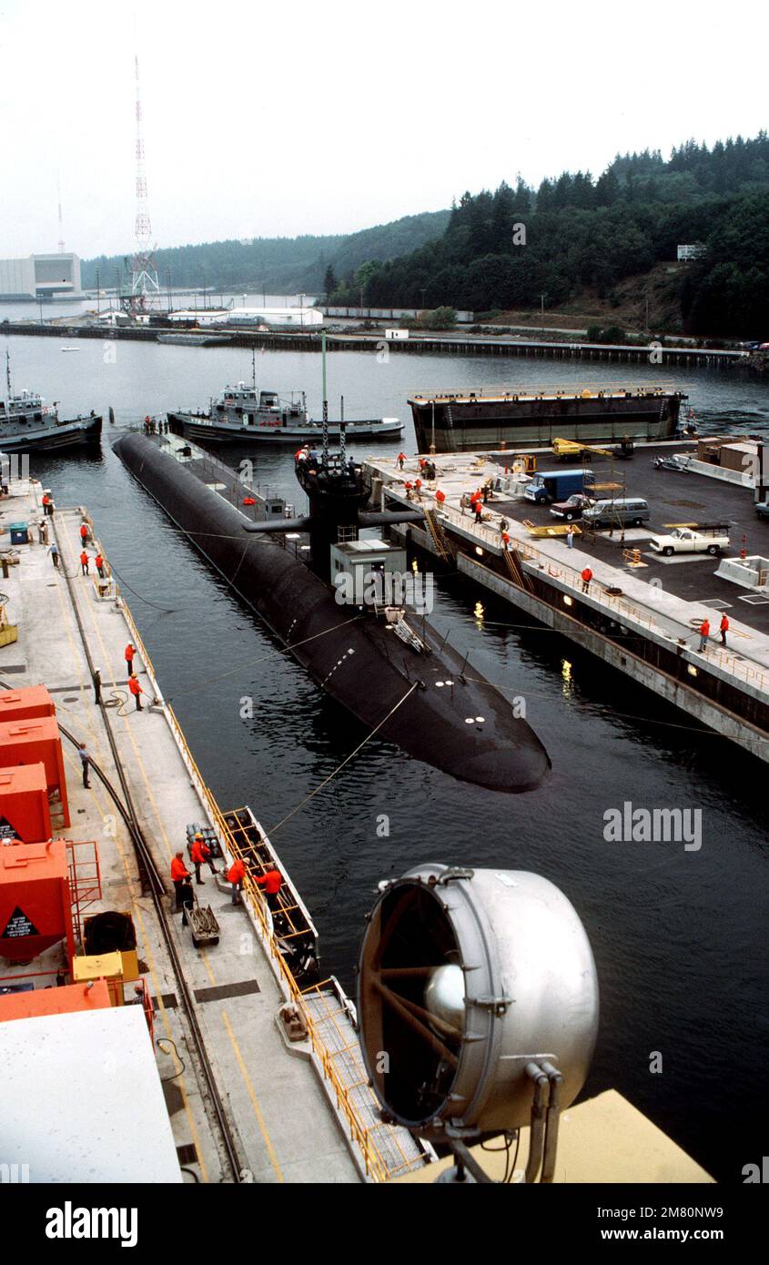 YTB 760-class harbor tugs guide the nuclear-powered strategic missile ...
